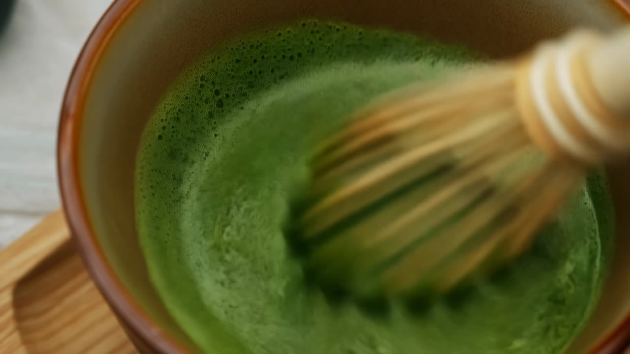 Frothy Matcha In Ceramic Bowl Whisk Bamboo Whisk Creates Airy Foam Over ...