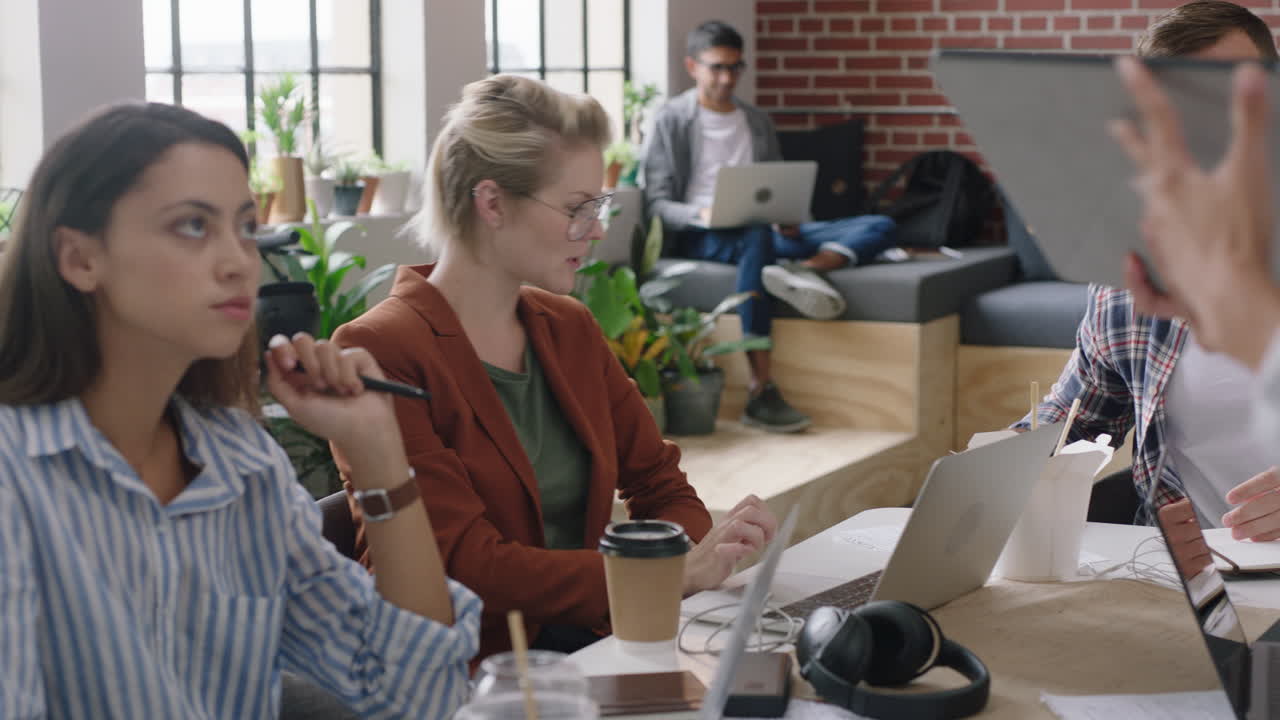 Premium stock video - Multi ethnic group of engineers developing mobile ...