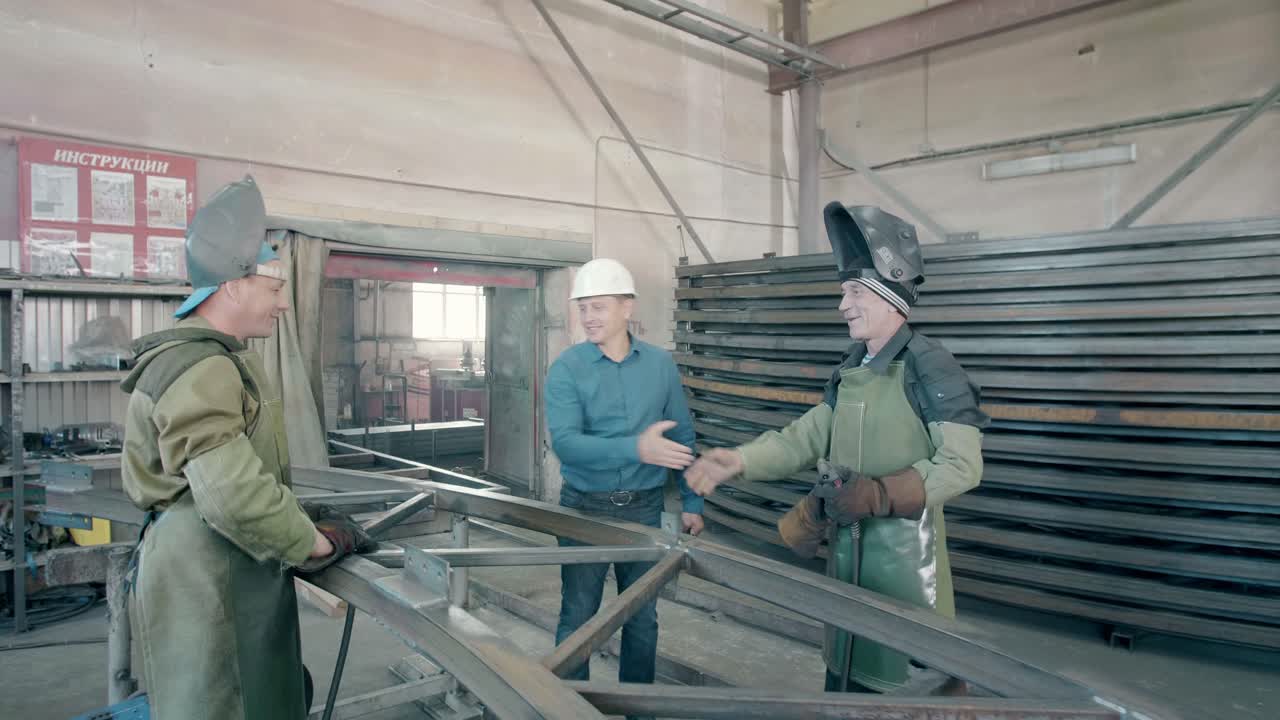 Factory Workers Handshake | Premium Stock Video Footage
