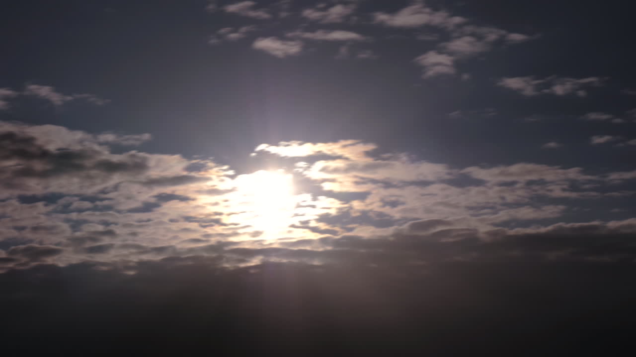 Shining sun and sunbeams through clouds. Timelapse | Premium Stock ...