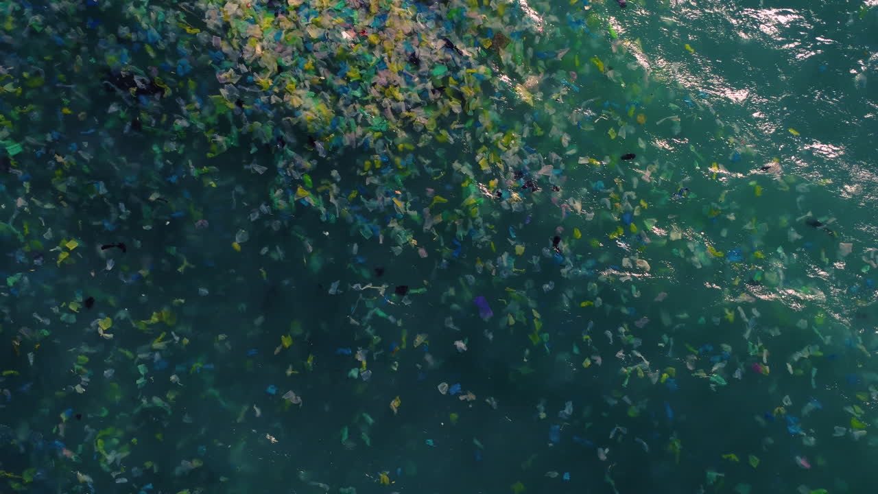 Aerial Reveal Polluted Plastic Bags Floating On Ocean Surface Free ...