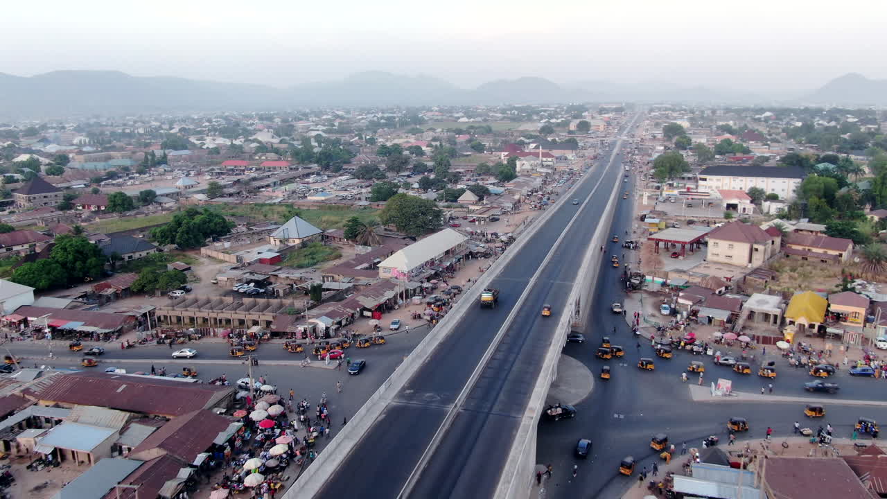 Premium stock video - New highway in jalingo town nigeria - aerial reveal