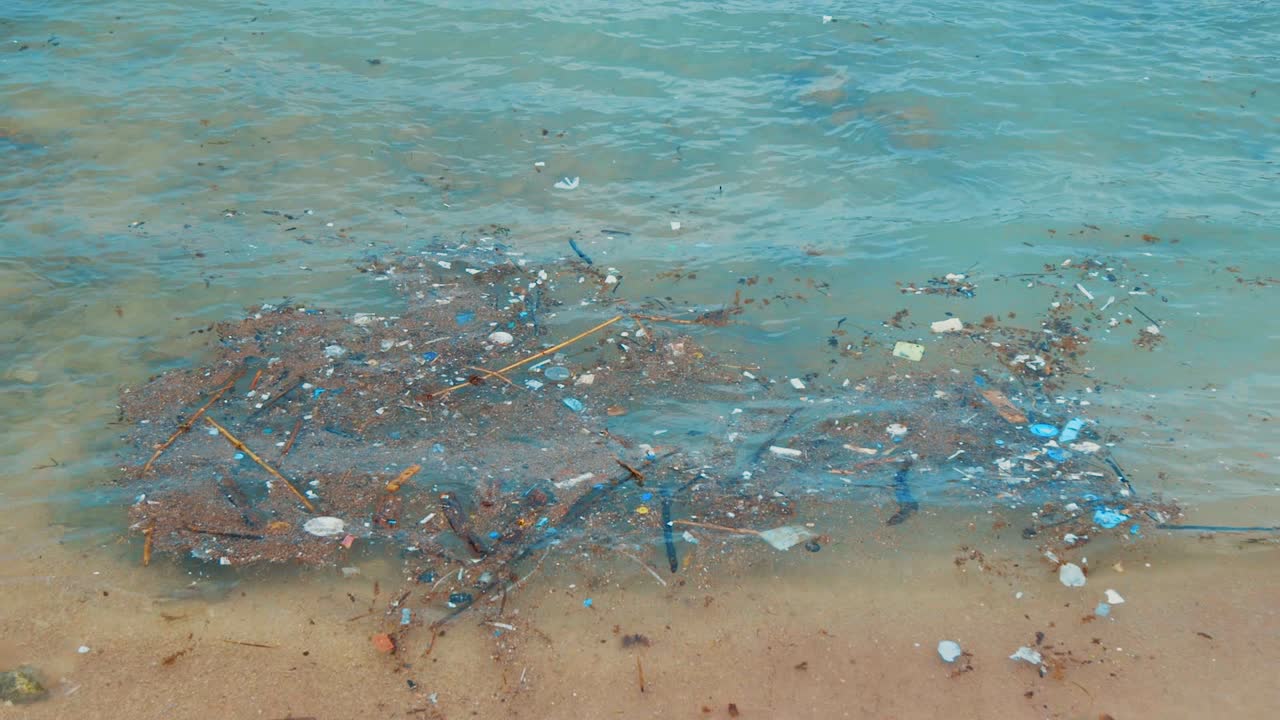 Premium stock video - Plastic pollution floating in caribbean sea on ...