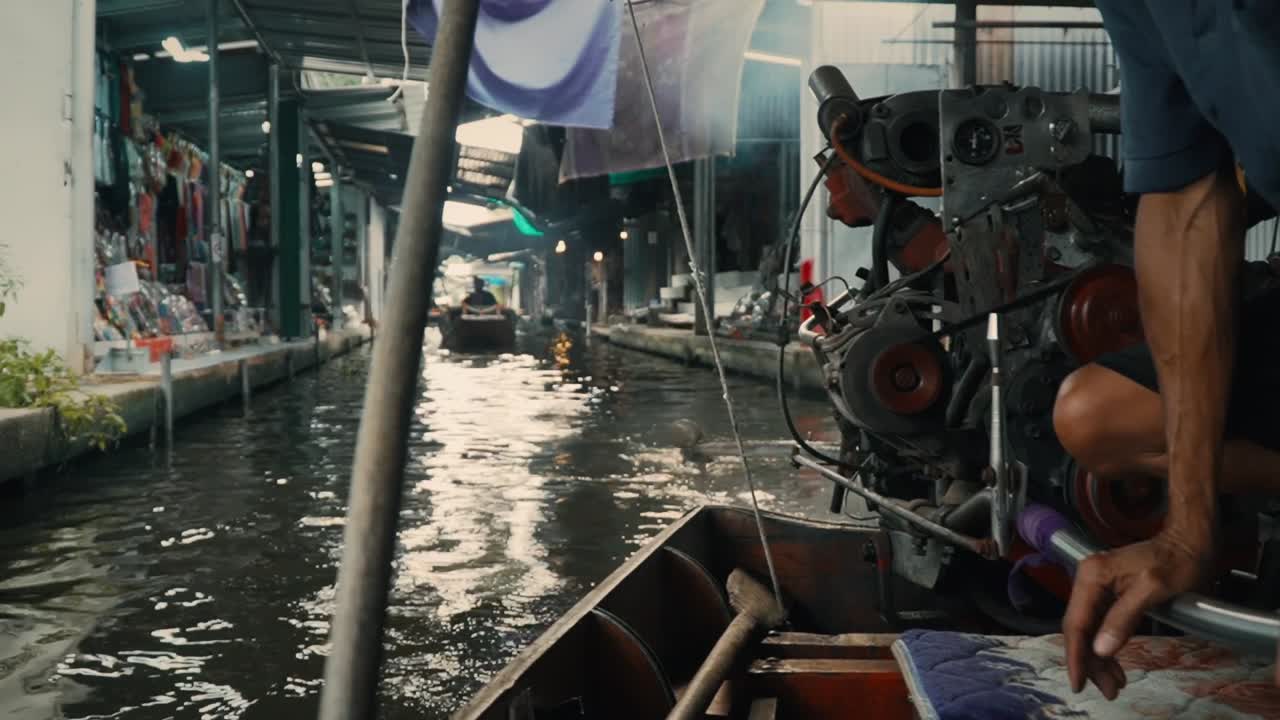 Traditional Long Tail Boat Driver Manually Controlling And Steering The ...