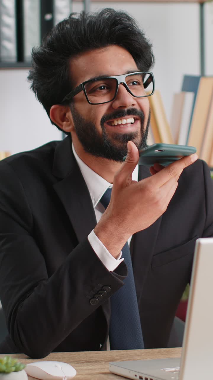 Indian business man working having mobile phone talk at office ...
