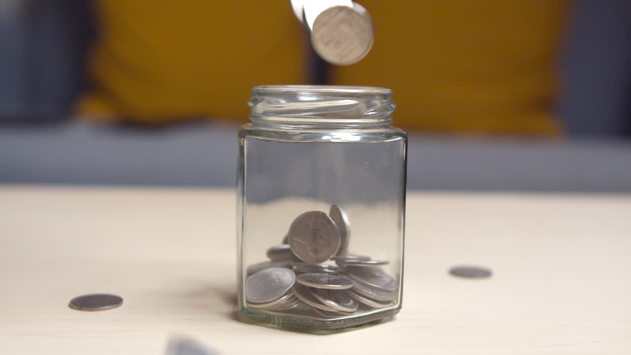 Slow motion of coin falling to moneybox with bounce Premium Stock Video ...
