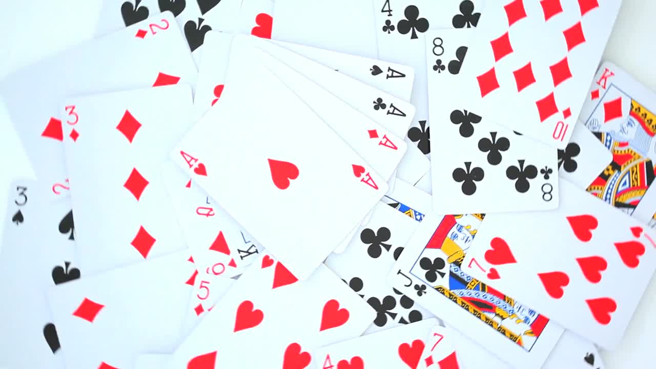 Premium stock video - Playing cards rotating