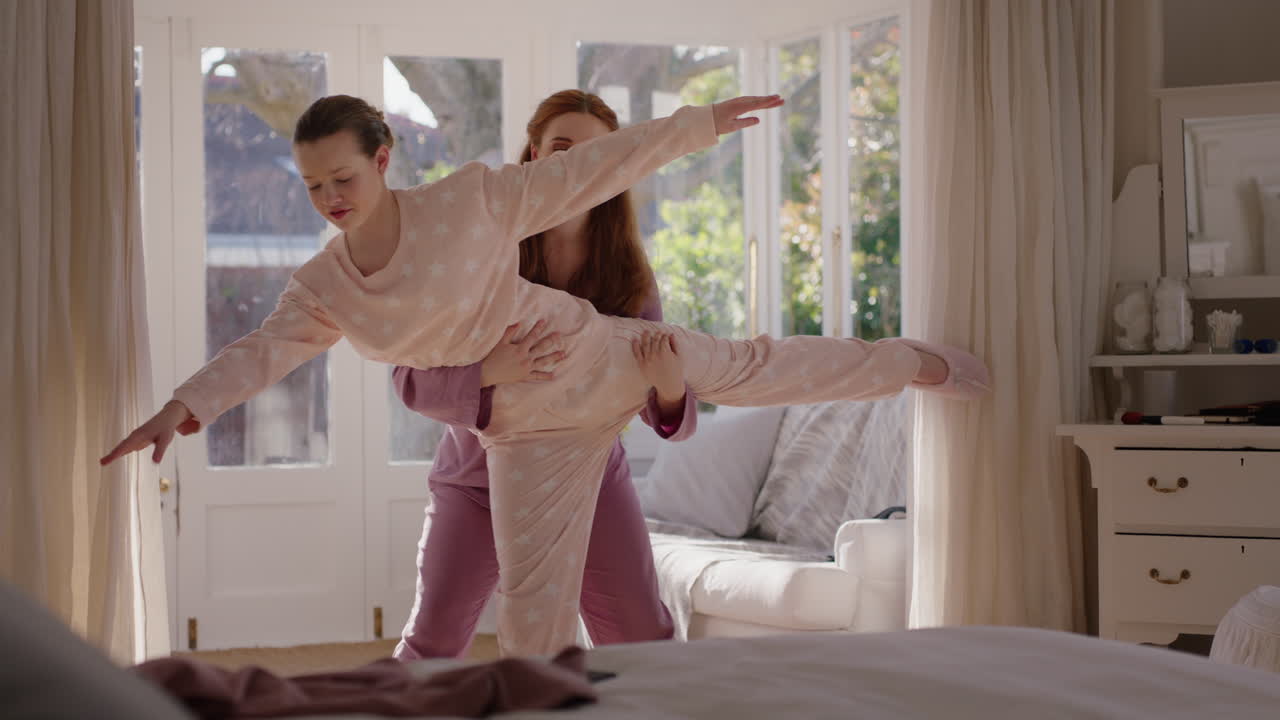 Premium stock video - Happy teenage girls practicing ballet dance moves ...