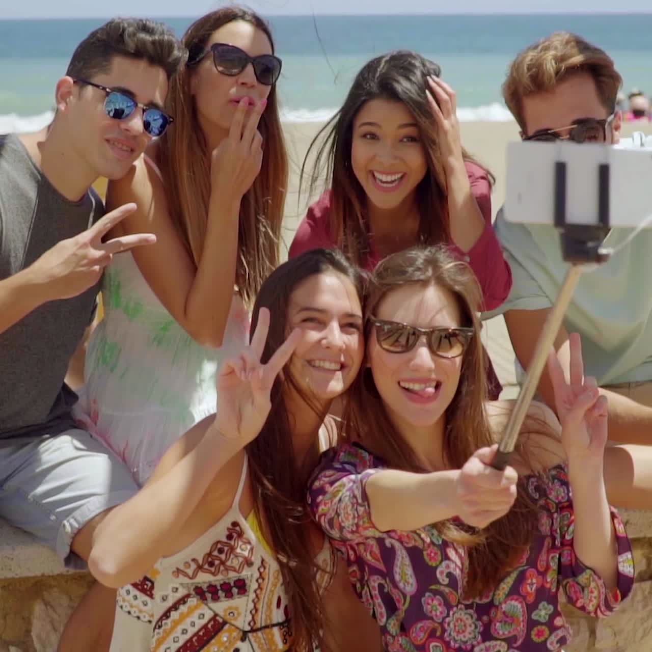 Premium stock video - Group of happy friends pulling goofy faces