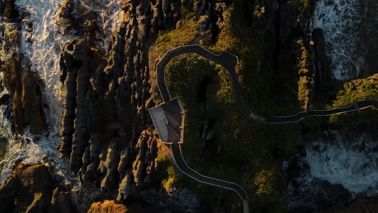Aerial top down to stunning geological formation, limestone cliffs and ...