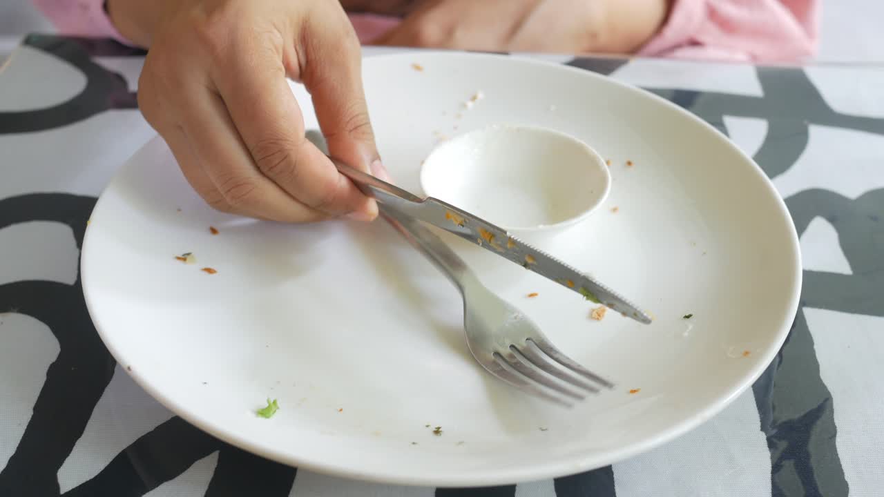 Premium stock video - Empty plate after eating on table