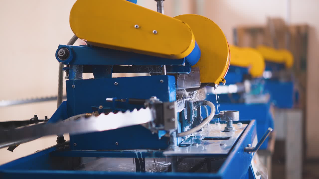 Premium stock video - Robotized machine tool sharpens band saw long ...