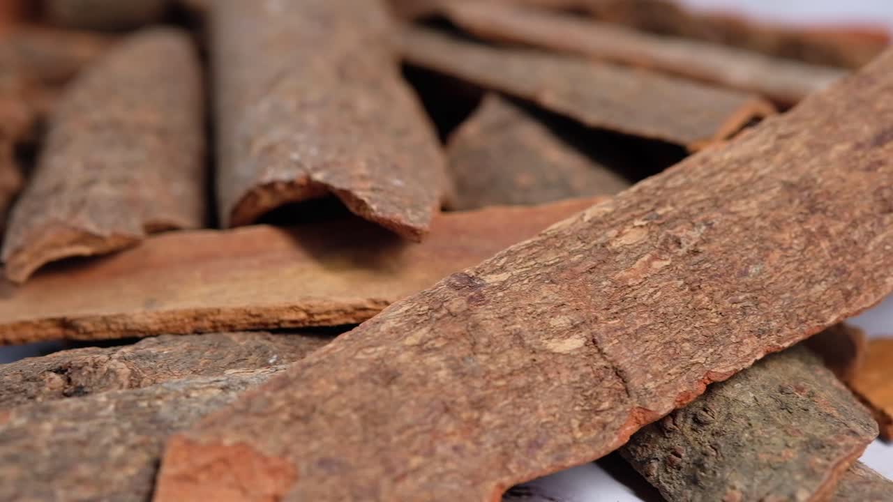 Pile of dried cinnamon sticks Premium Stock Video Footage