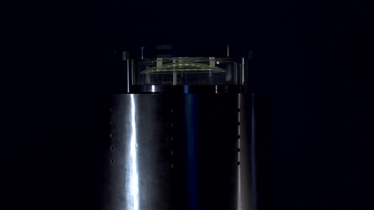 Medium Shot Of A Device That Can Keep A Water Drop Suspended Through ...