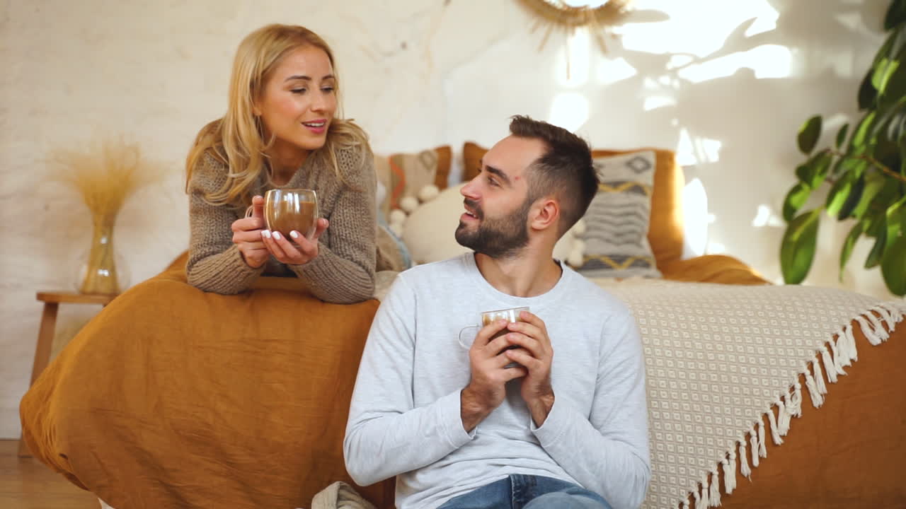 Free stock video - Couple have a cup of hot chocolate and a romantic ...