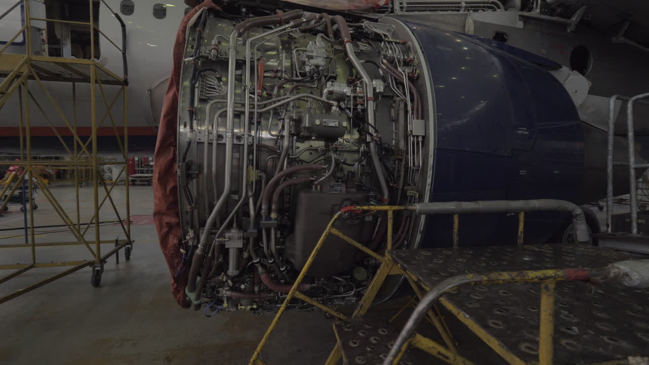 Premium stock video - Jet engine undergoing repairs