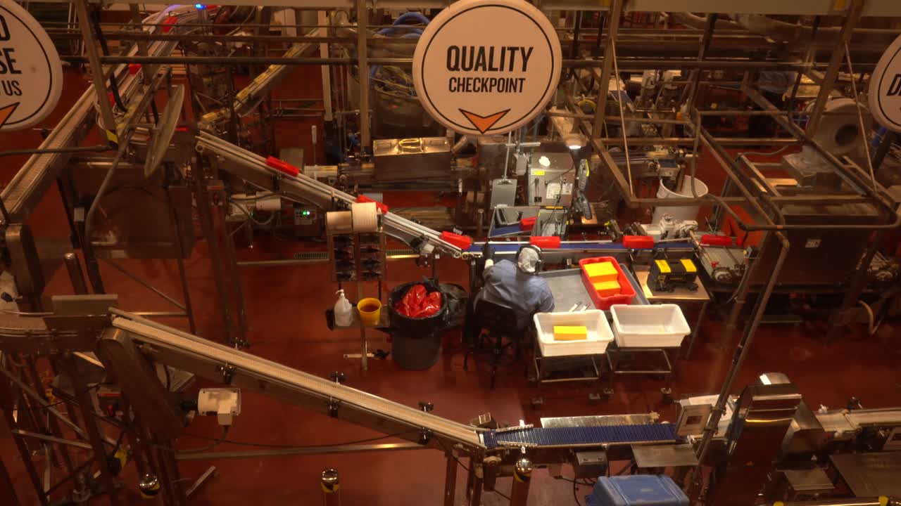Premium stock video - Quality control checkpoint inside factory