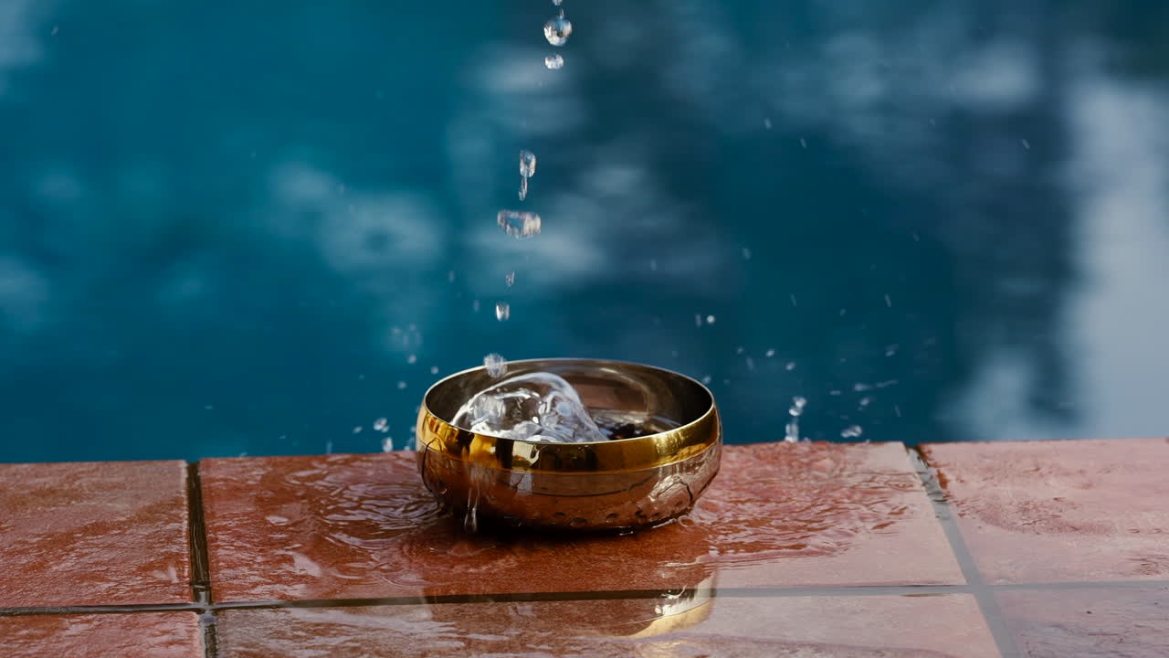 Dropping A Small Piece Of Metal In A Bowel Of Water Causing A Big ...