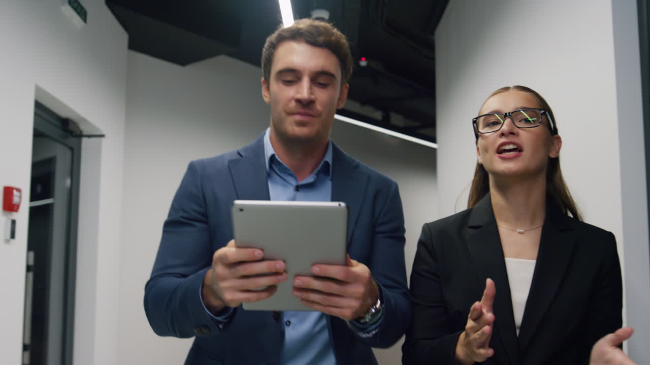 Premium stock video - Office employees high five celebrating success ...