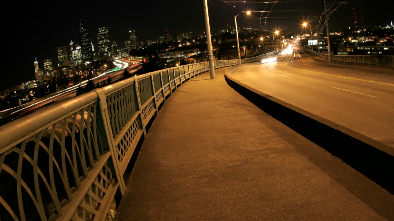 Premium stock video - Pedestrians and traffic cross a bridge in seattle ...