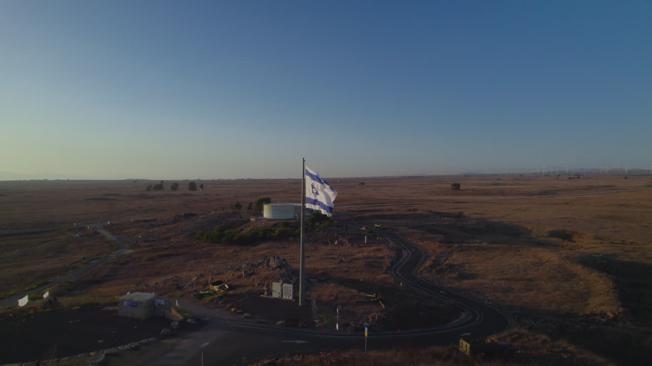 The flag symbolizing Israel's war is in the Golan Heights on the Tel ...