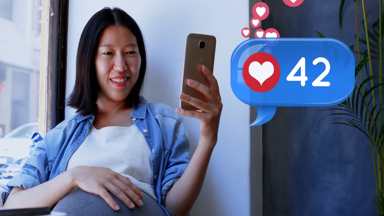 Premium stock video - Pregnant woman texting 4k