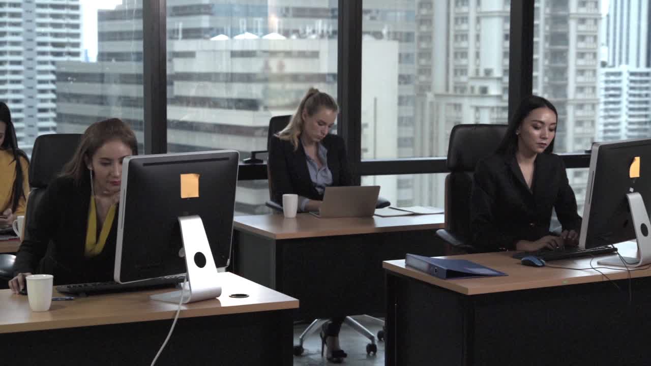Premium stock video - Business people working with desktop computer in ...