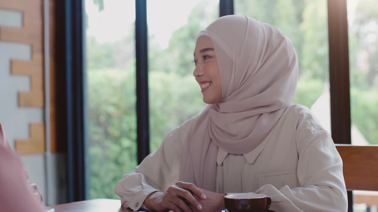 Premium stock video - Upwardly mobile asian muslim business entrepreneur sme start up group of ...