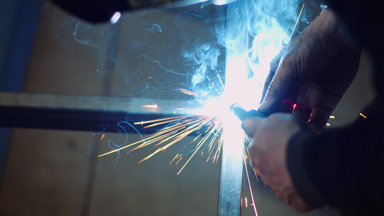 Premium stock video - Industry welder welding steel construction 16