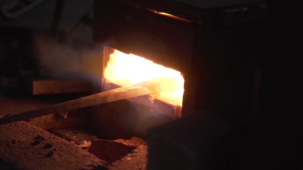 Premium stock video - Blacksmith metal forging in 4k