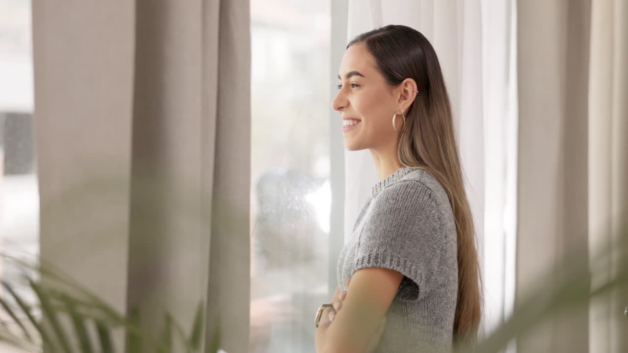 Premium stock video - Window, laughing and woman thinking while standing