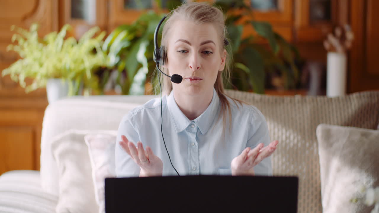 Premium stock video - Sales representative in headset speaking to ...