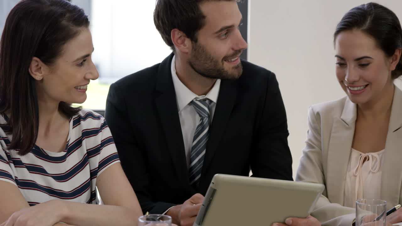 Premium stock video - Business people using technology
