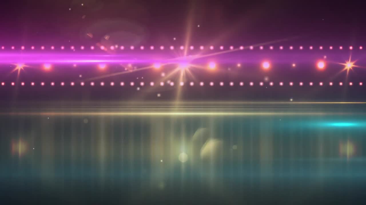 Video Of Glowing Pink Spot Lights And Snow Falling Free Stock Video ...