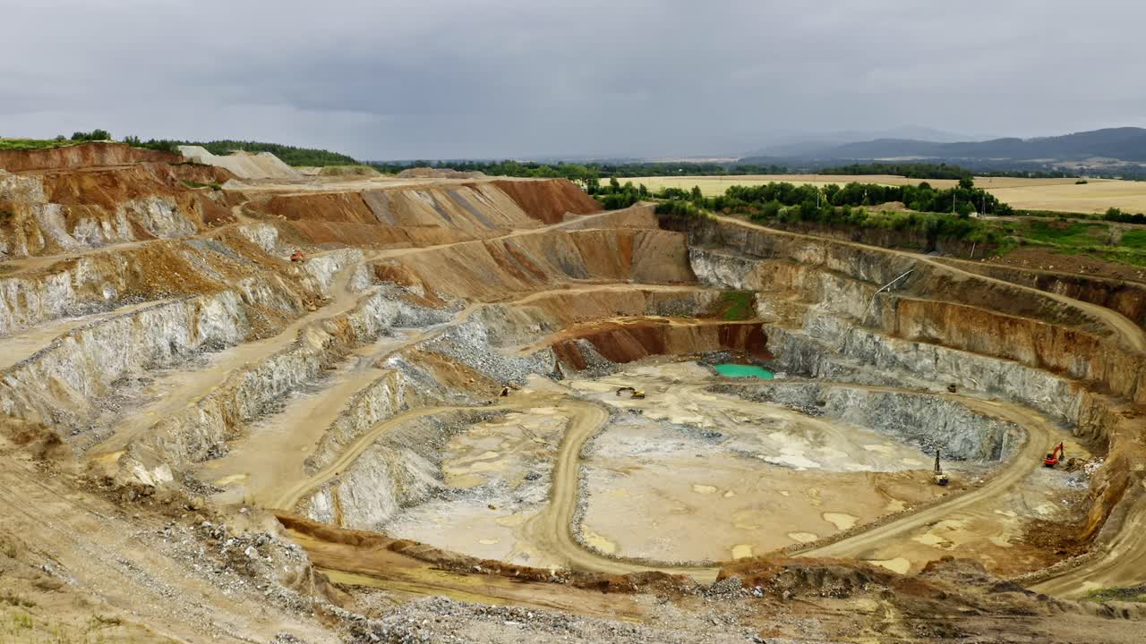 Premium stock video - Drone aerial reveal shot of mining quarry site in ...