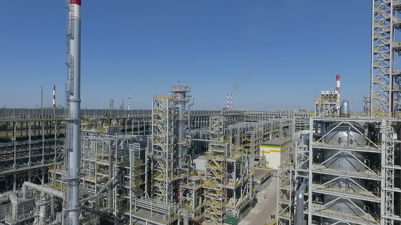 Premium stock video - A vertical inspection of some unit of an oil refinery