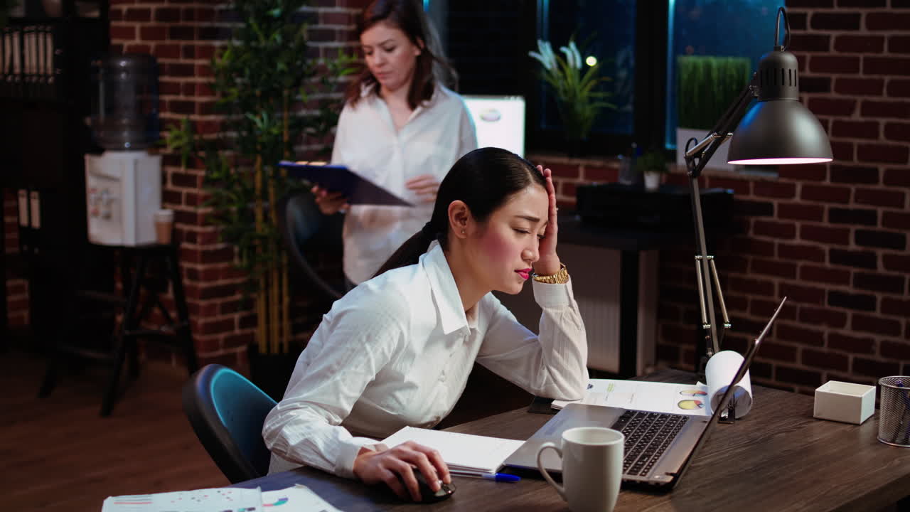 Worker squinting eyes in exasperation, feeling overworked Premium Stock ...