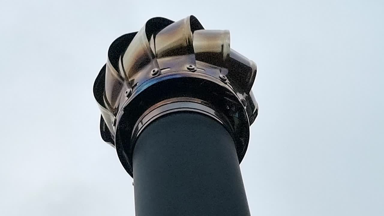 Premium stock video - Looking up at stainless steel chimney cap ...