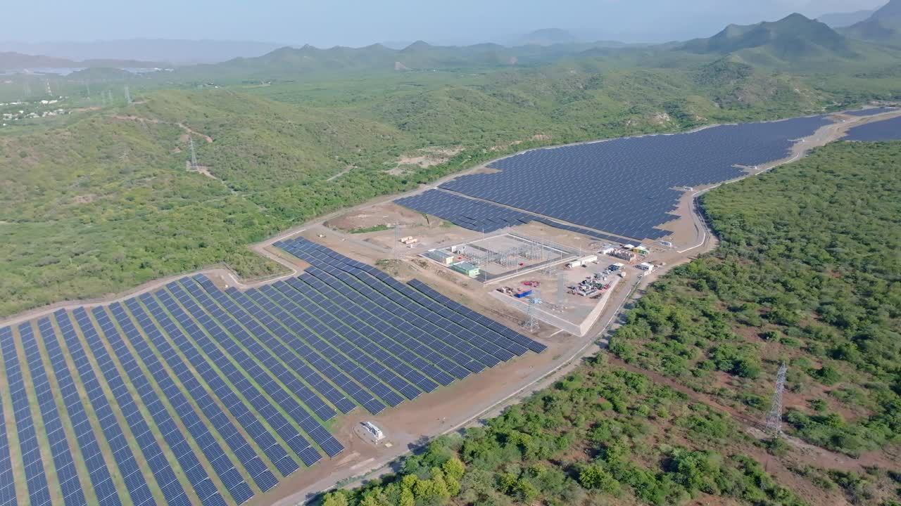 Premium stock video - Huge expanse of solar panels in photovoltaic park ...