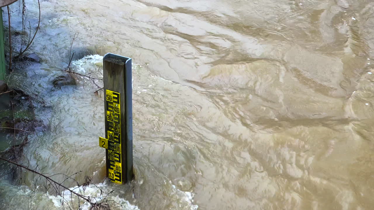 At A Water Level Meter Standing In The River, You Can Read The Water ...