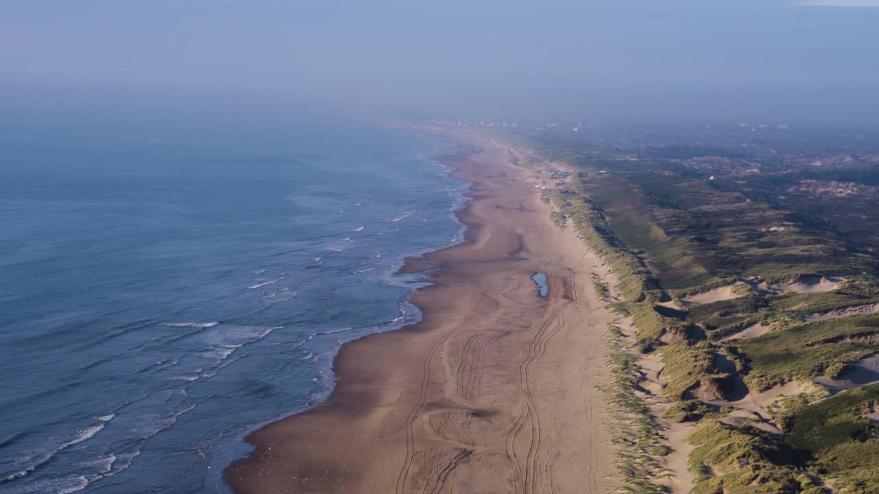 A Dynamic Aerial Footage Of The Dunes Of Meijendel Which Is The Largest ...