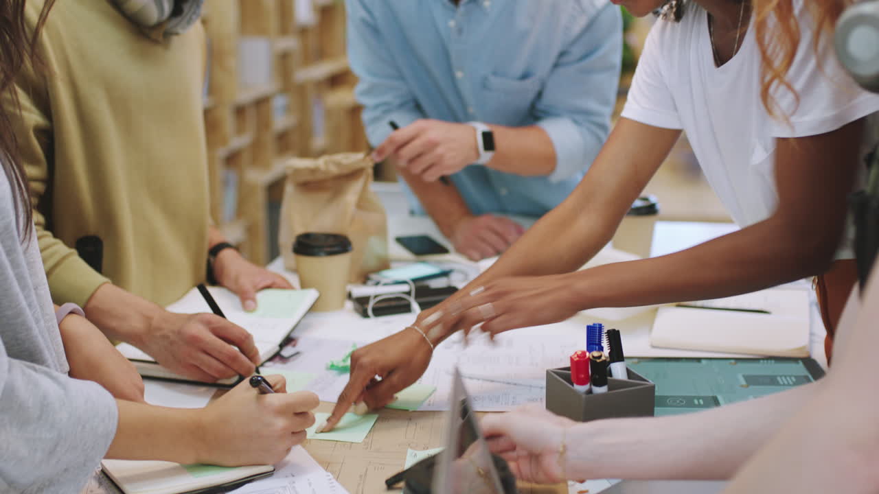 Hands, teamwork and planning with design Premium Stock Video Footage