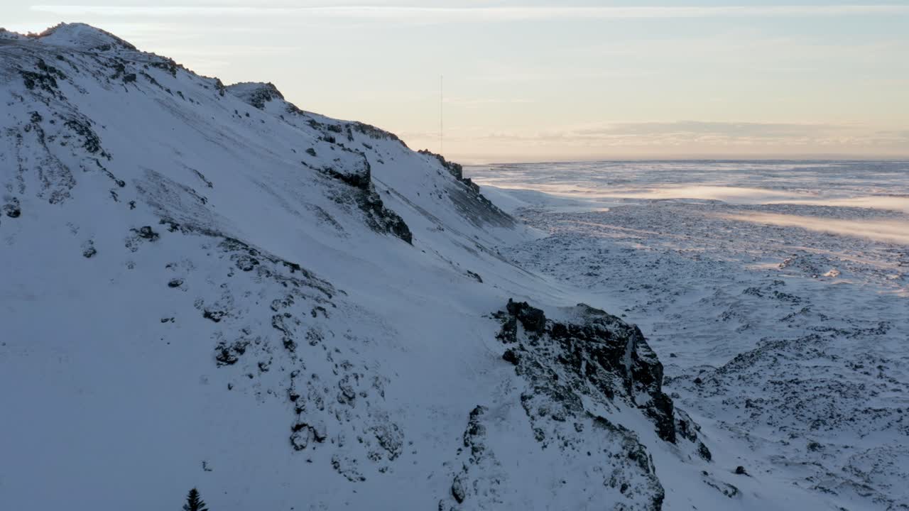 Volcanic Rock Mountain With Snow And Sun Peaking Over Ridge, Cinematic ...