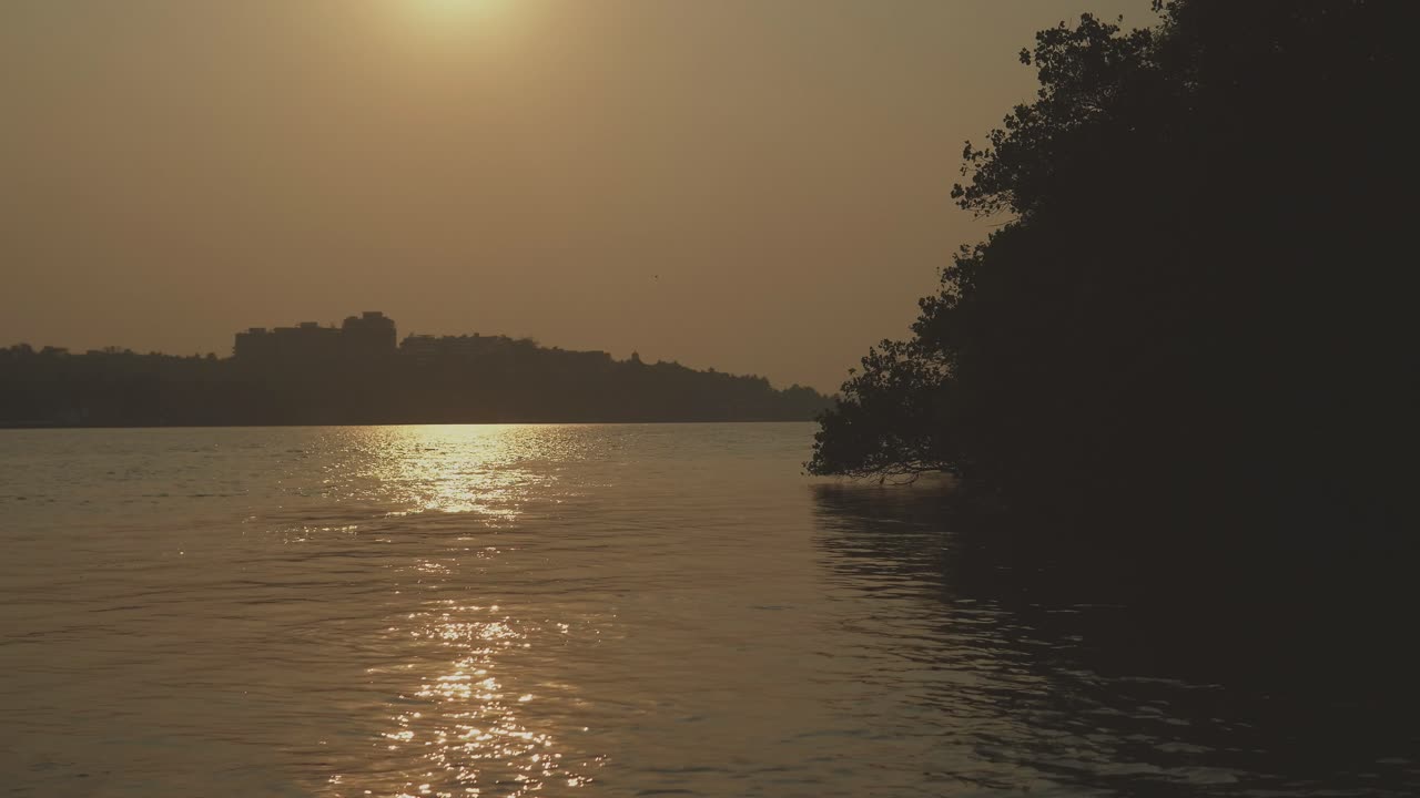 A beautiful sunrise over rajbagh beach in canacona, south goa, india ...