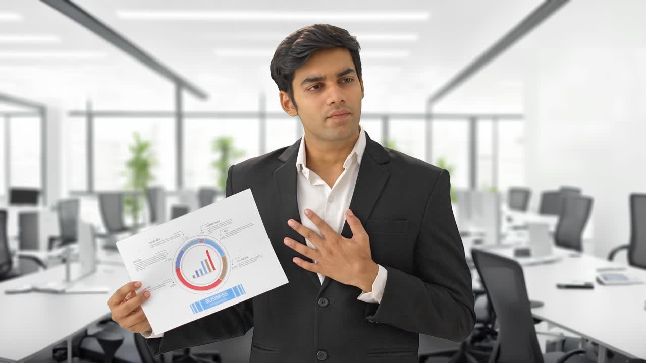 Premium stock video - Indian manager explaining plans to employees