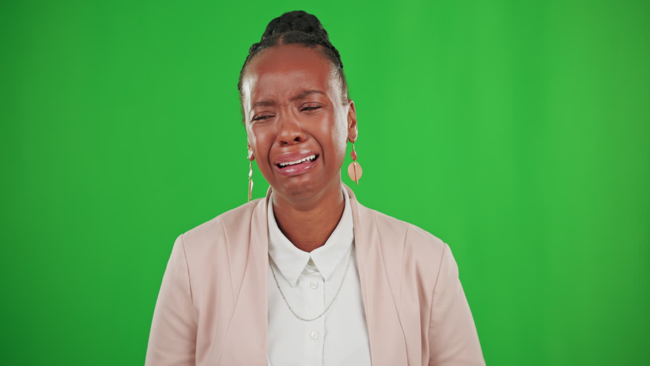 Premium stock video - Crying, green screen and black woman with sadness