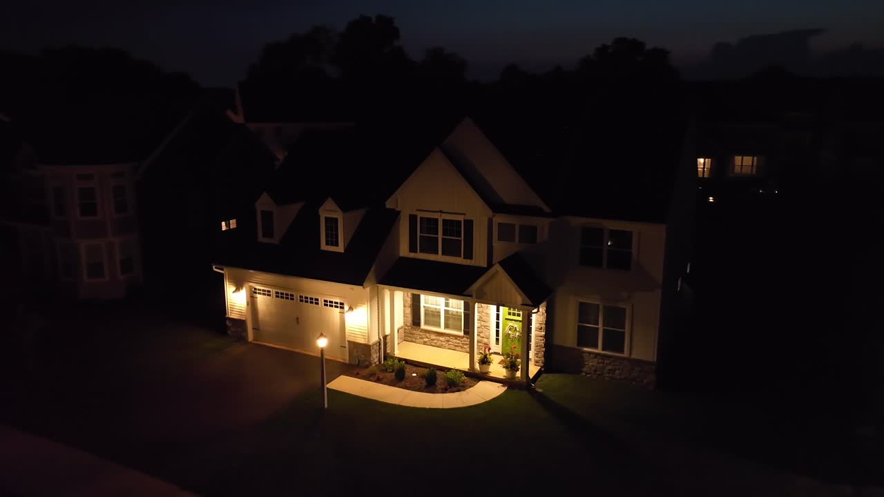 Upscale american home at night Premium Stock Video Footage