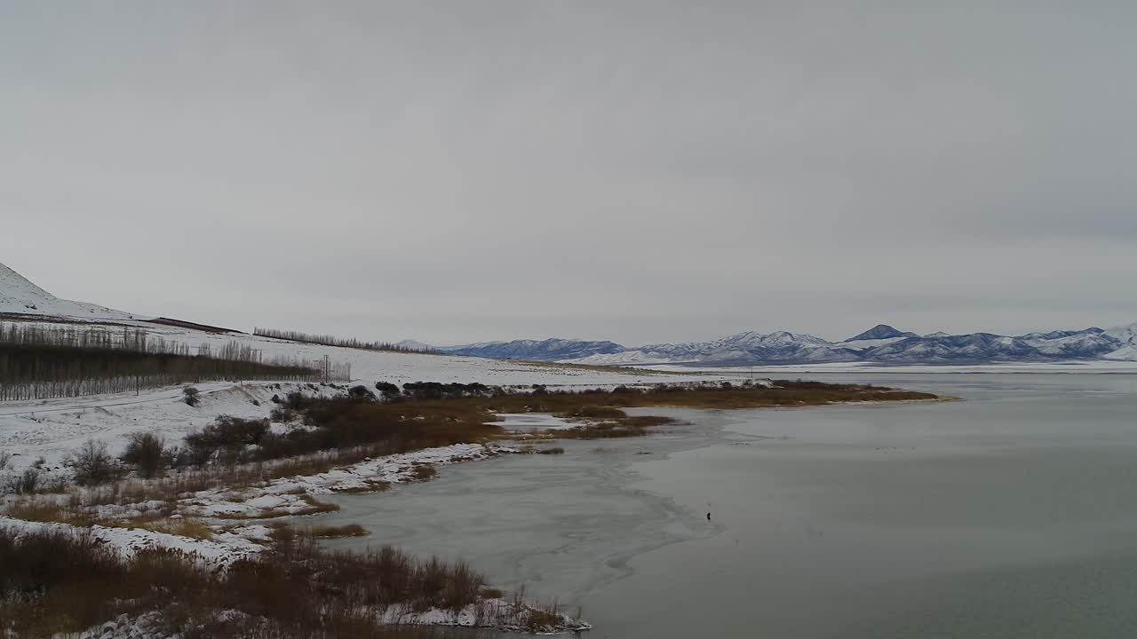 Ice Forms Along The Shoreline Of The South End Of Utah Lake Near ...