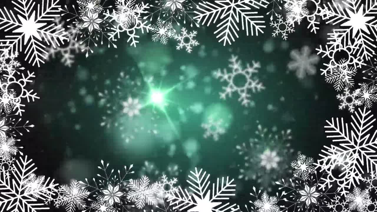 Premium stock video - Beautiful snowflakes rotating on a green ...