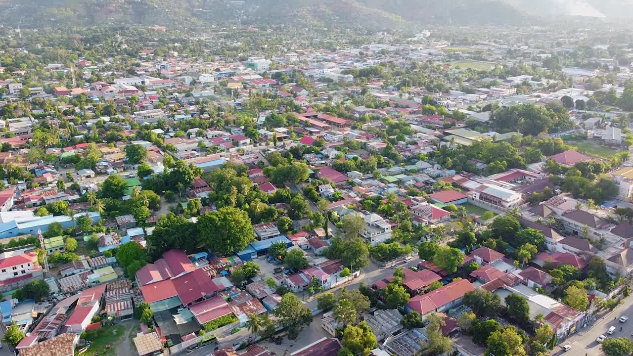 Premium stock video - Aerial drone rising over capital dili, timor ...